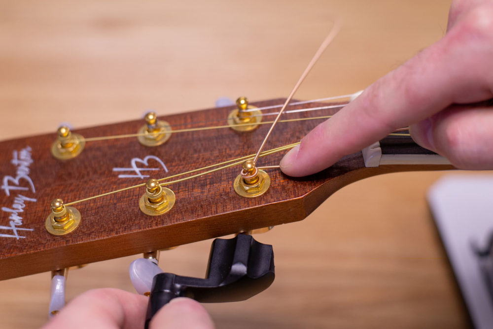 How To Change Guitar Strings Guide Yousician